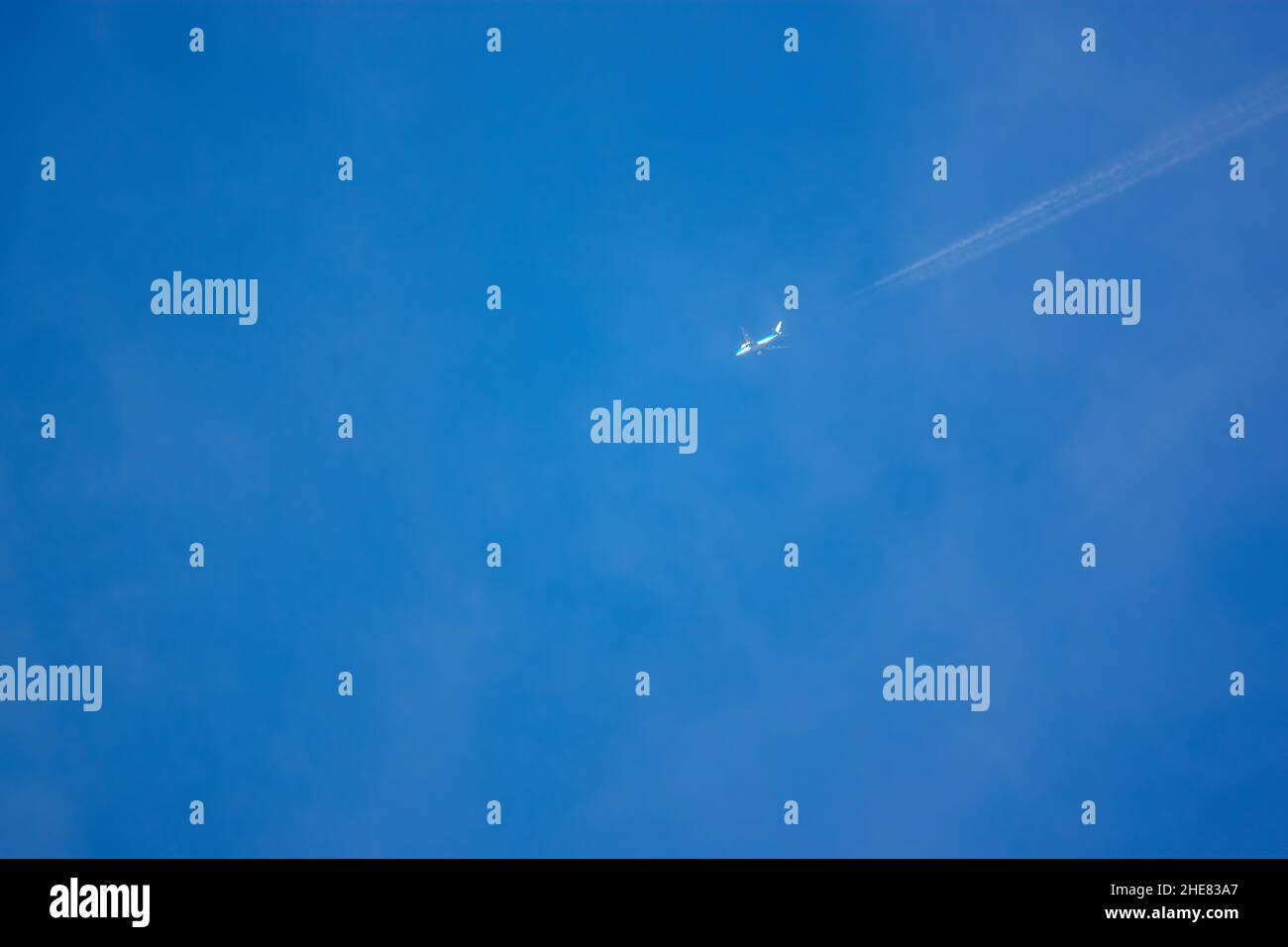 high altitude contrails from a KLM Boeing 787-10 dreamliner en route to ...