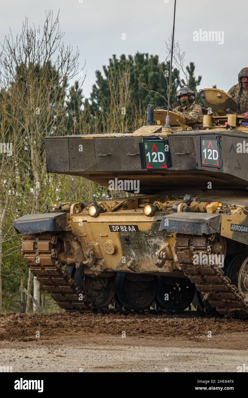 close up of a british army challenger 2 main battle tank in action on a military exercise ...