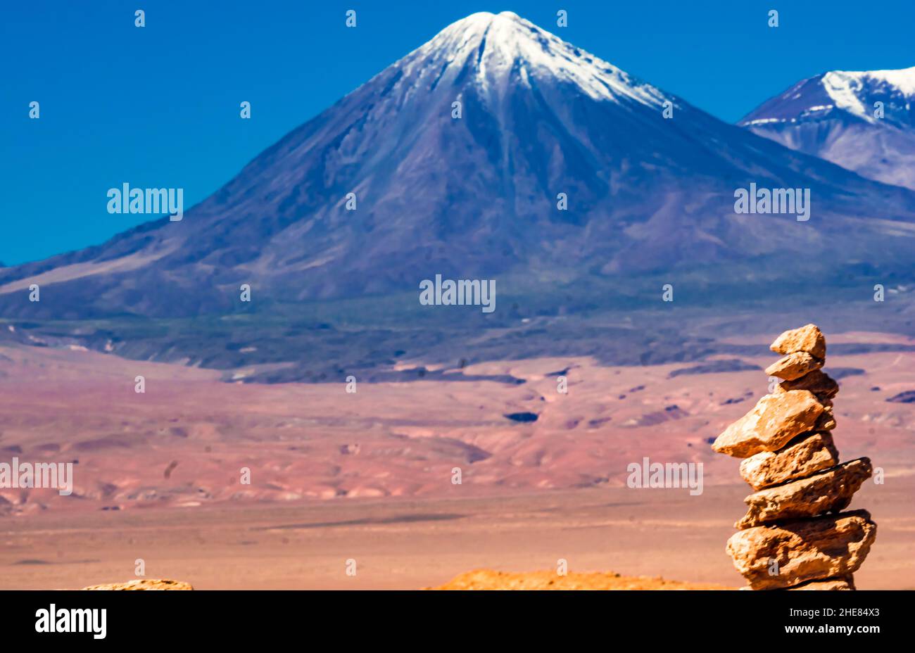 Stones in friont of Volcanoe Licancabur, Moon Valley, Atacama desert ...