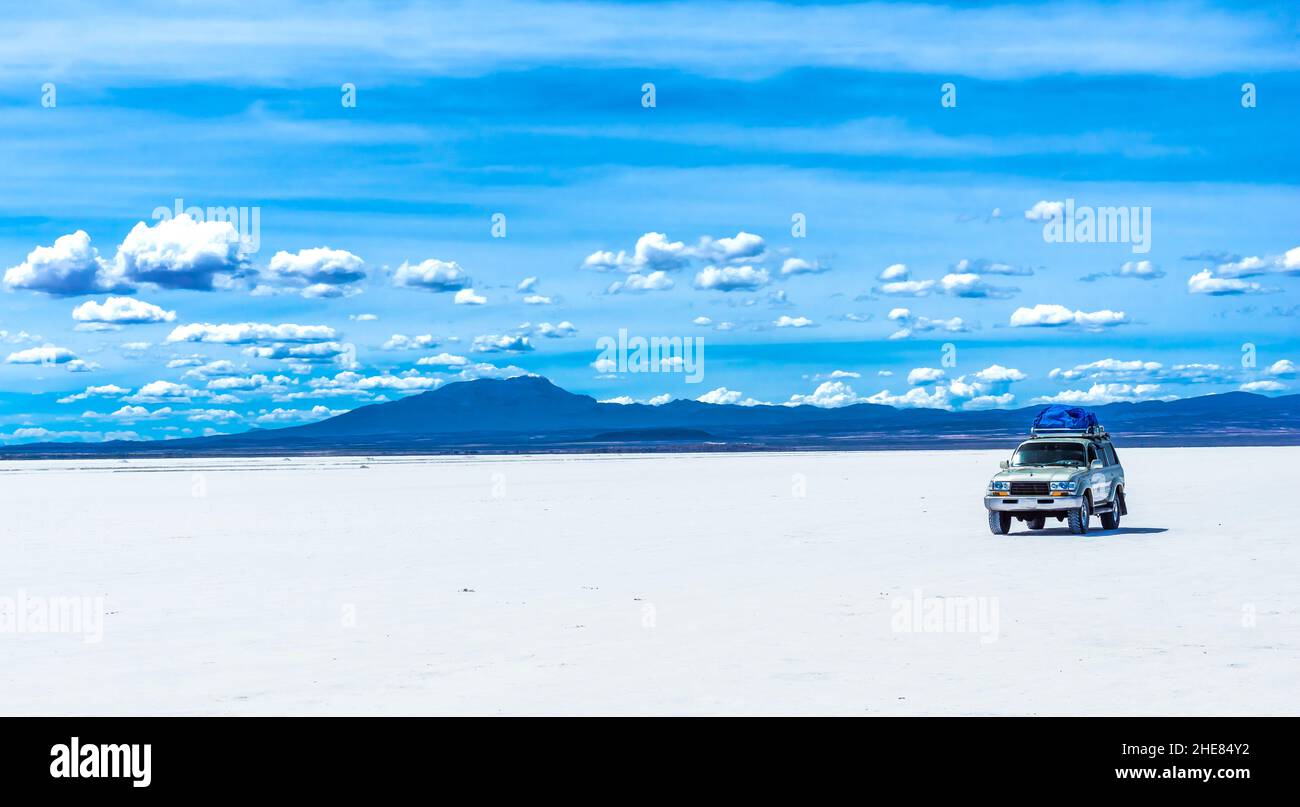 Off-road car in the Salar de Uyuni is largest salt flat in the World ...