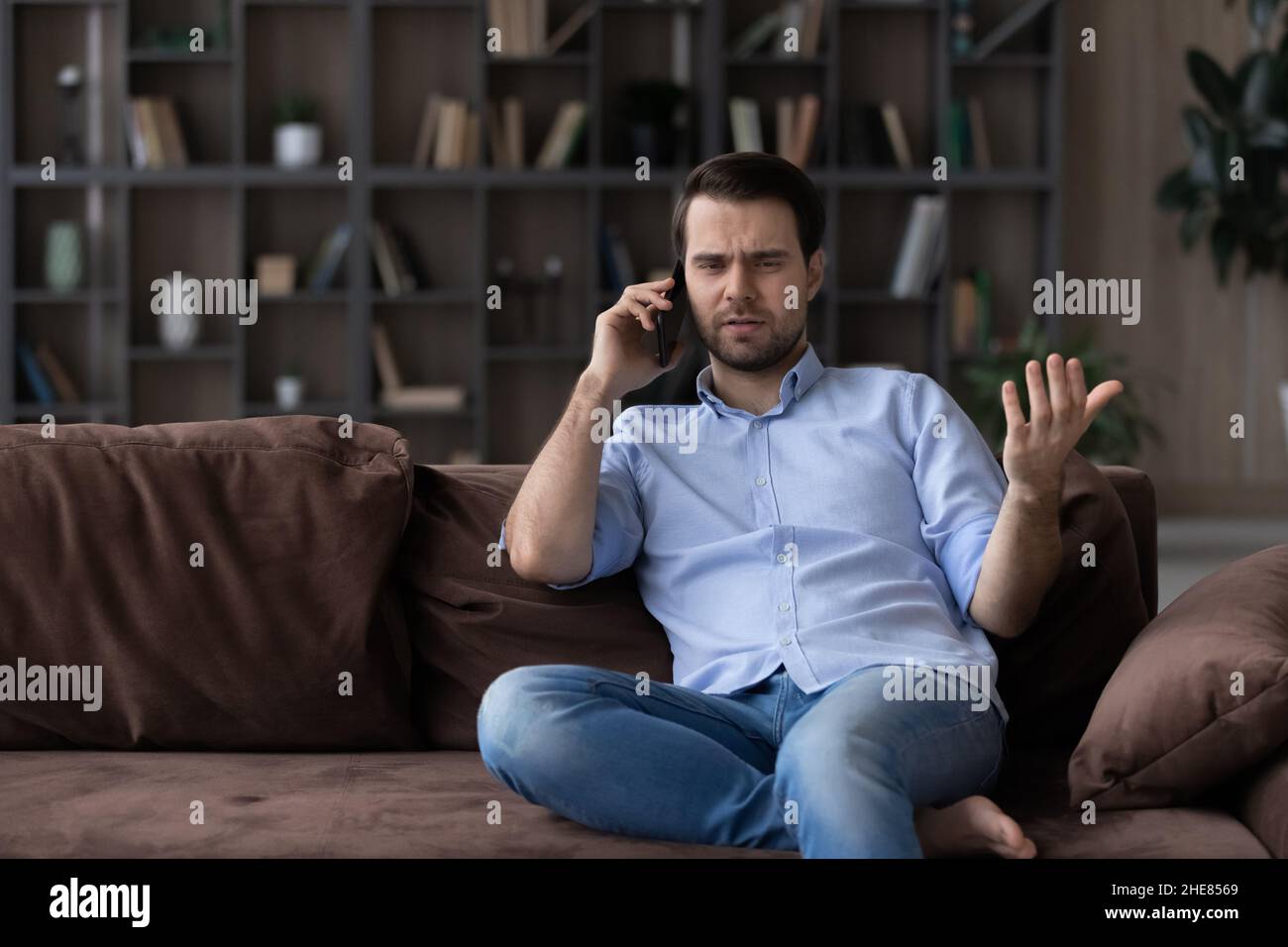 Upset businessman arguing on phone hi-res stock photography and images ...