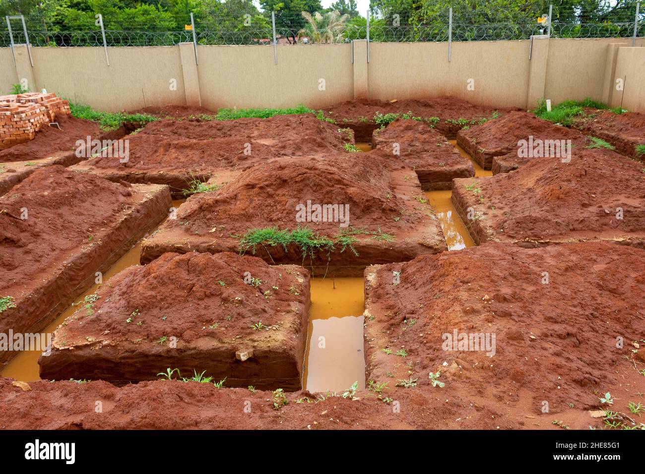 Building foundation that was dug in sand soil. The dug out soil was ...