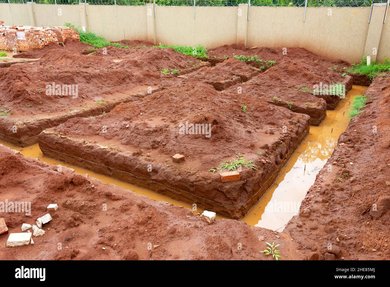 Building foundation that was dug in sand soil. The dug out soil was ...