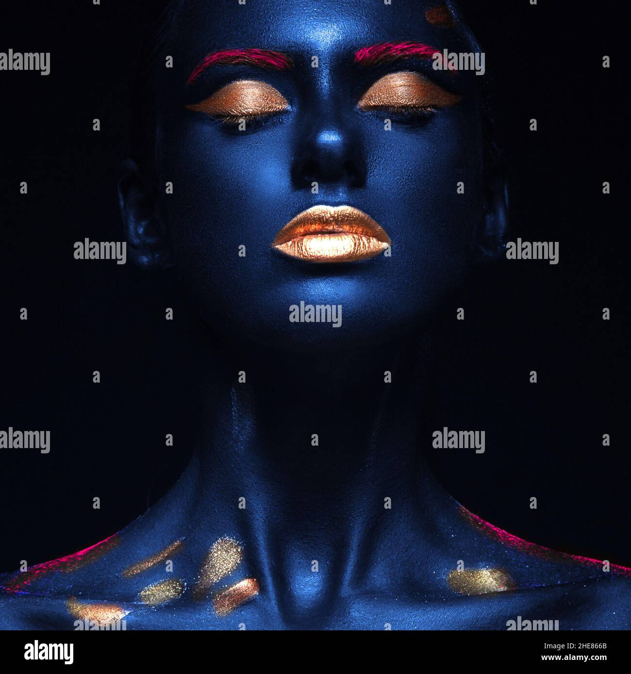 fashion portrait of a blue-skinned girl with color make-up. Beauty face ...