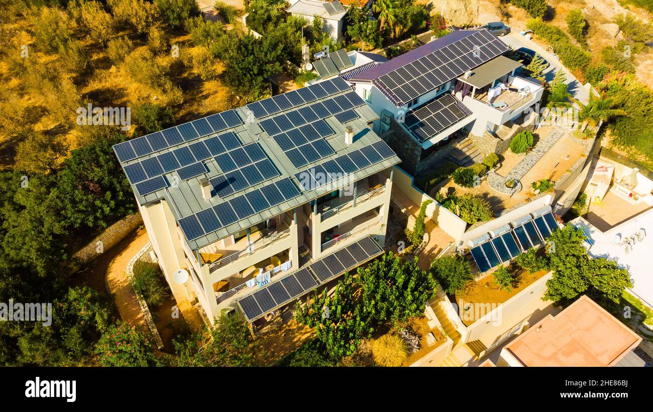 Large solar panel installation on roof Stock Photo - Alamy