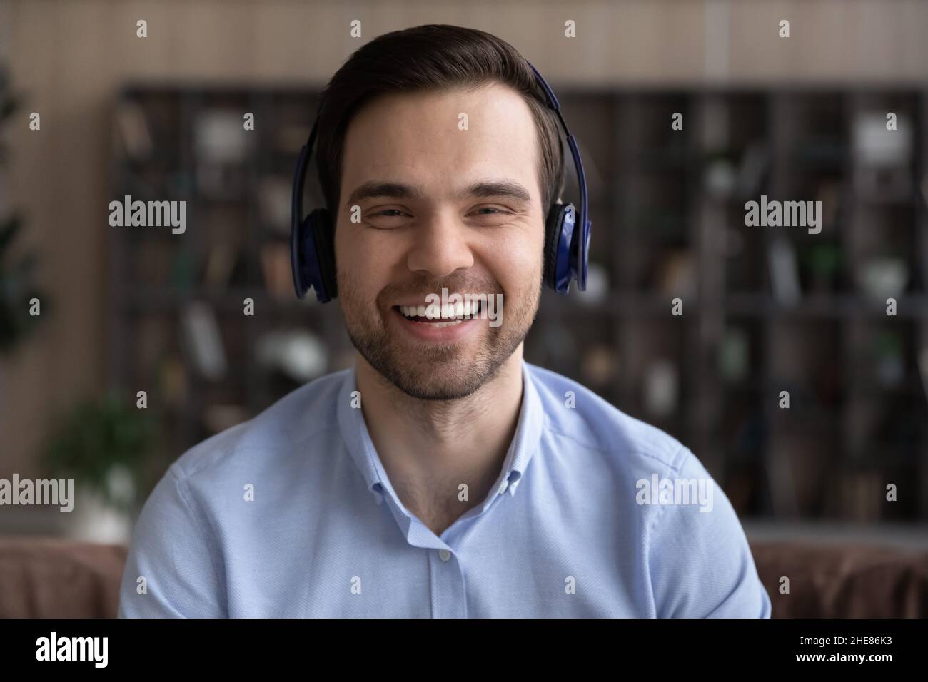 Man headphones laughing hi-res stock photography and images - Alamy