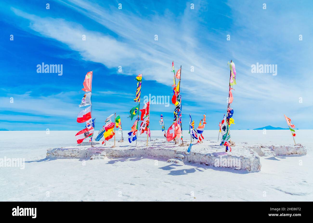 Flags of all participating countries at the Dakar monument on the Salar ...