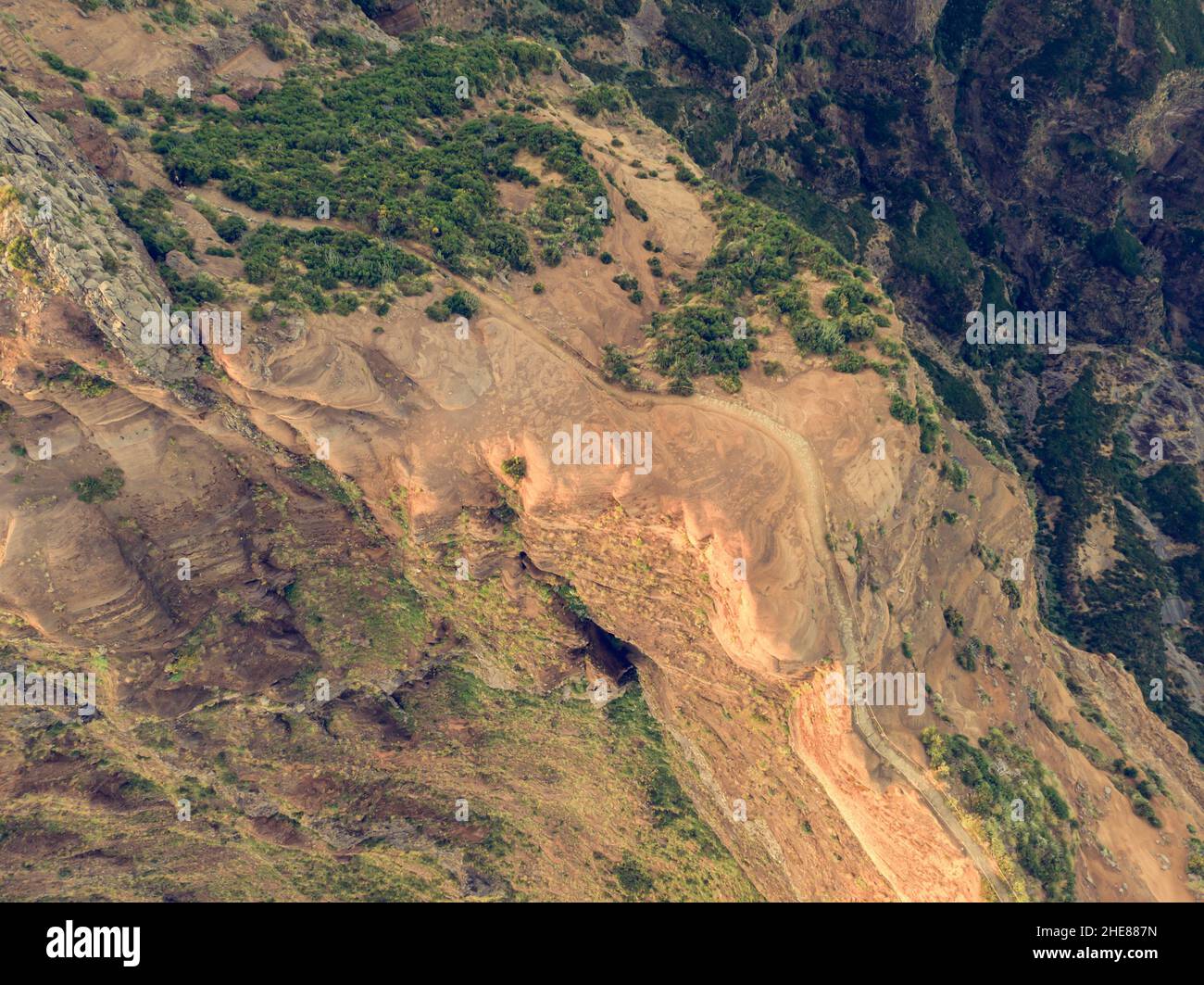 Drop down view of trail following volcanic mountain ridge Stock Photo ...