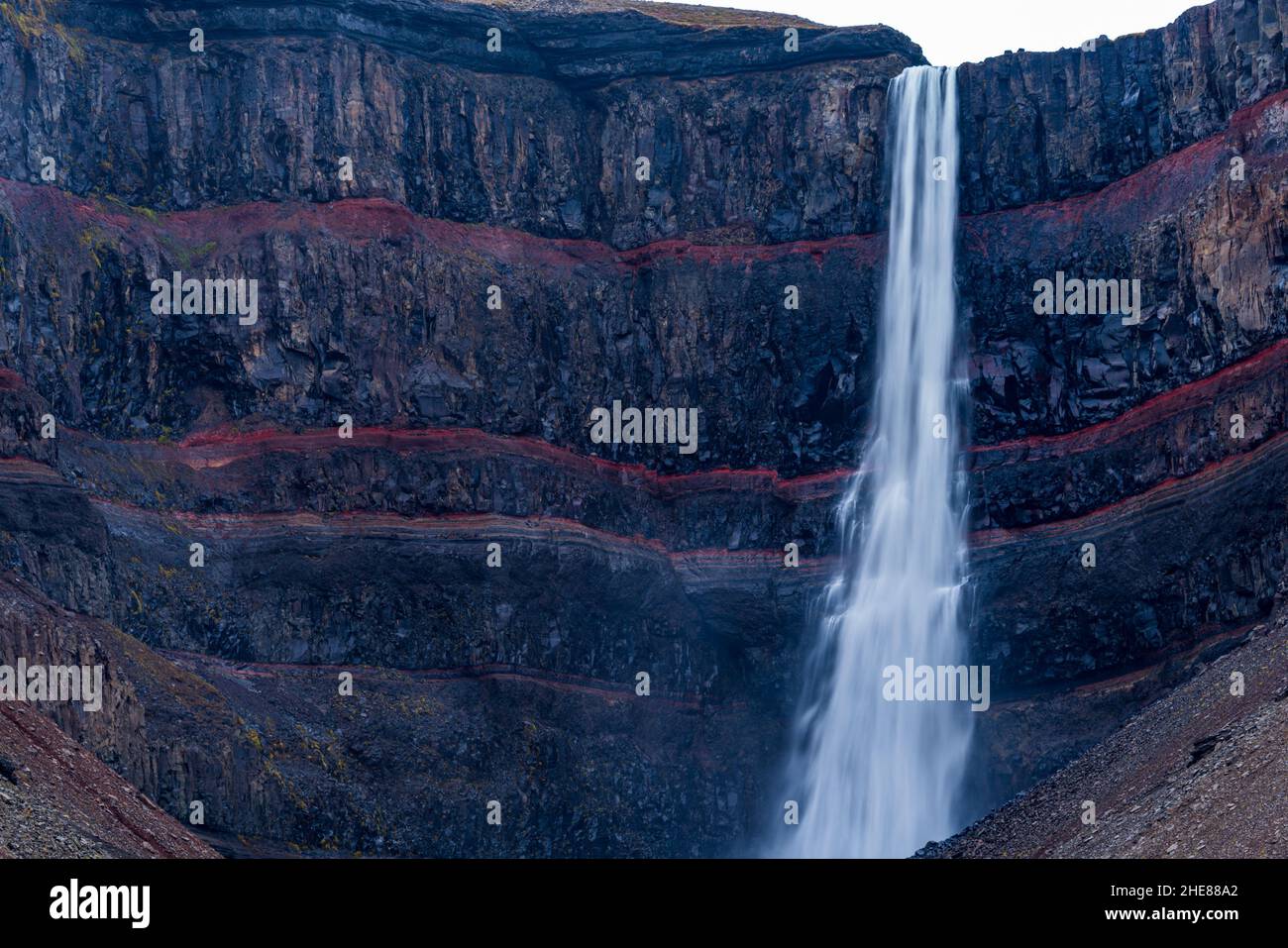 Svartifoss waterfall and red layers in Iceland Stock Photo - Alamy