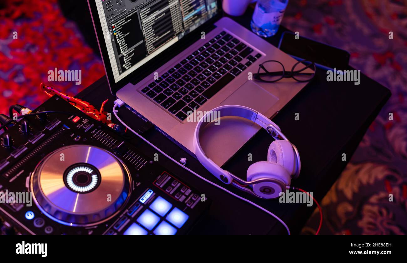 DJ mixing console. Tune in before a concert Stock Photo - Alamy
