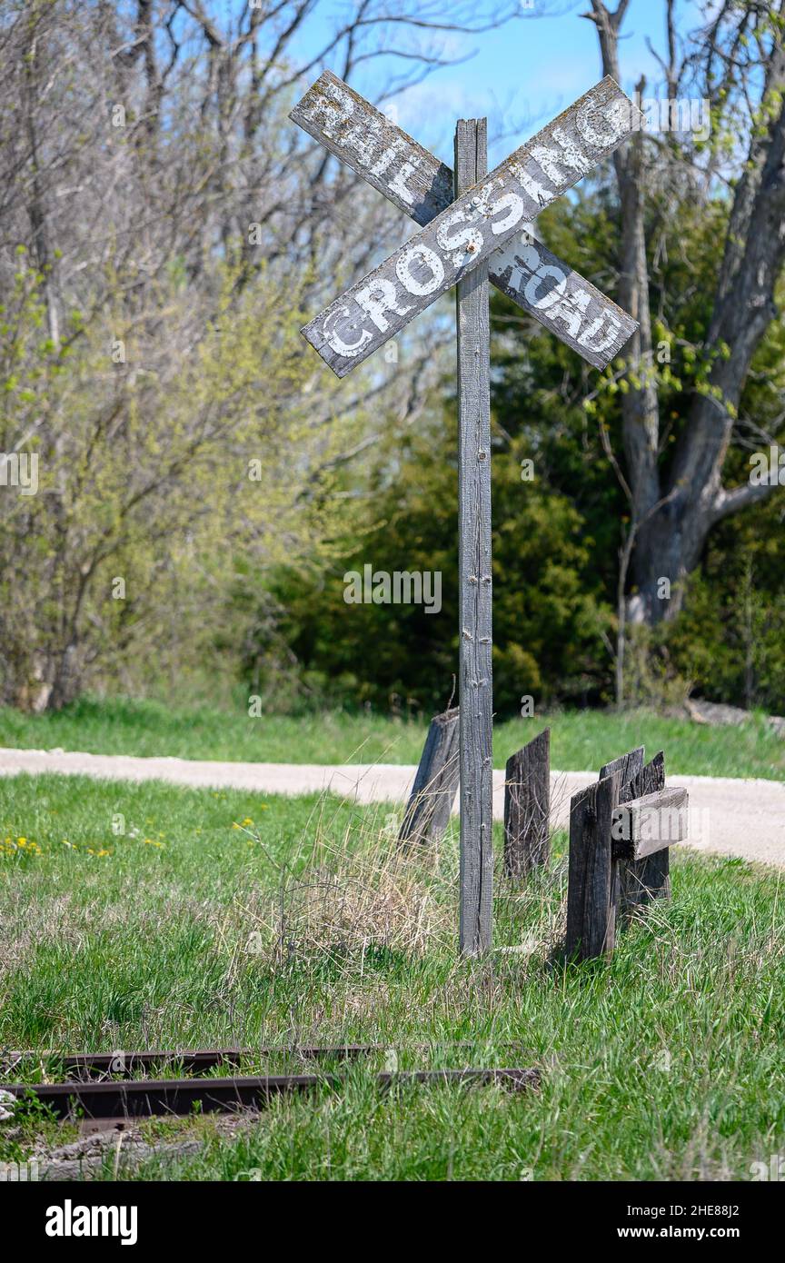 Wooden railroad crossing sign on a summer day Stock Photo - Alamy