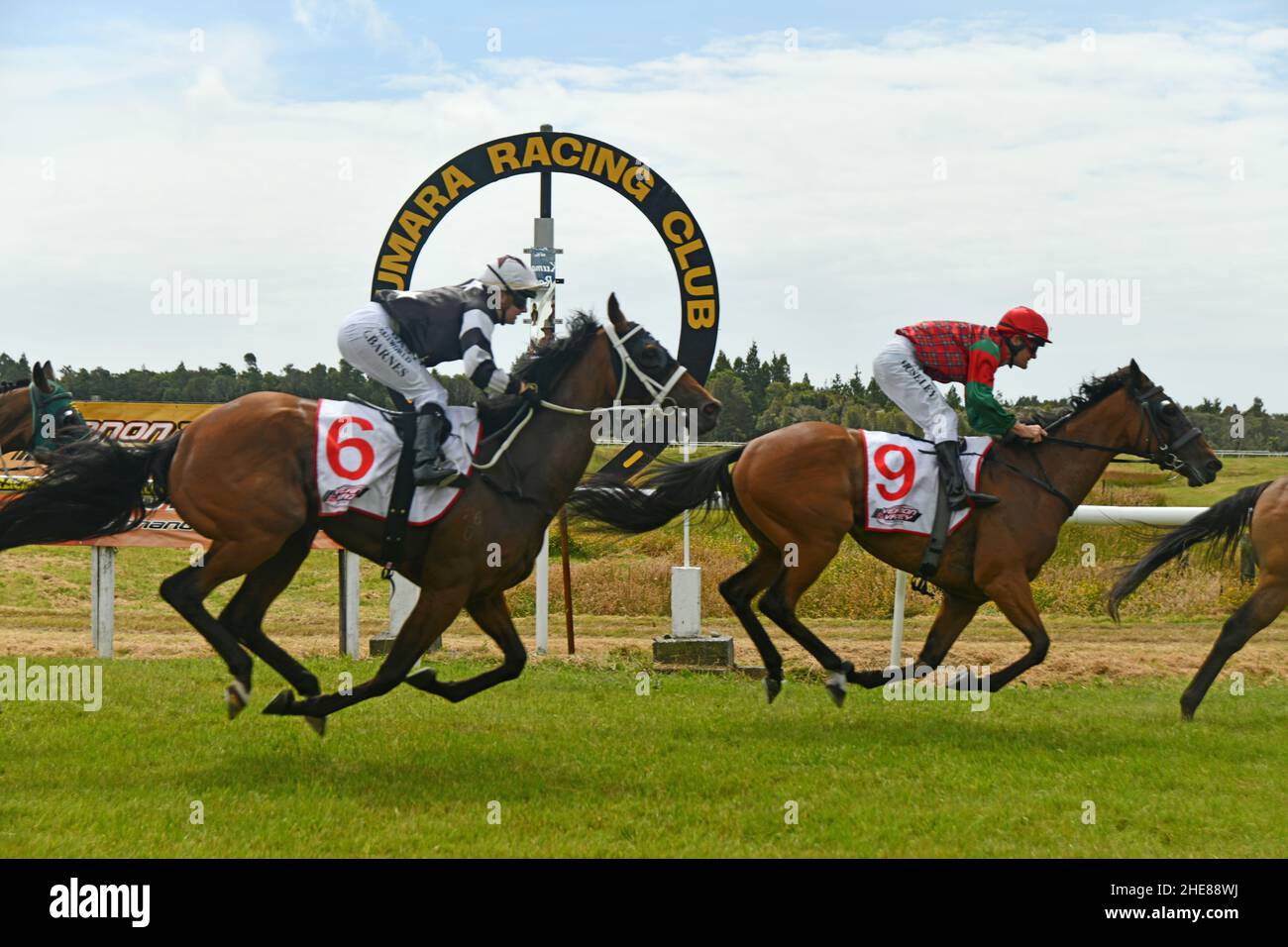 KUMARA, NEW ZEALAND, JANUARY 8, 2022; jockeys ride their mounts hard to ...