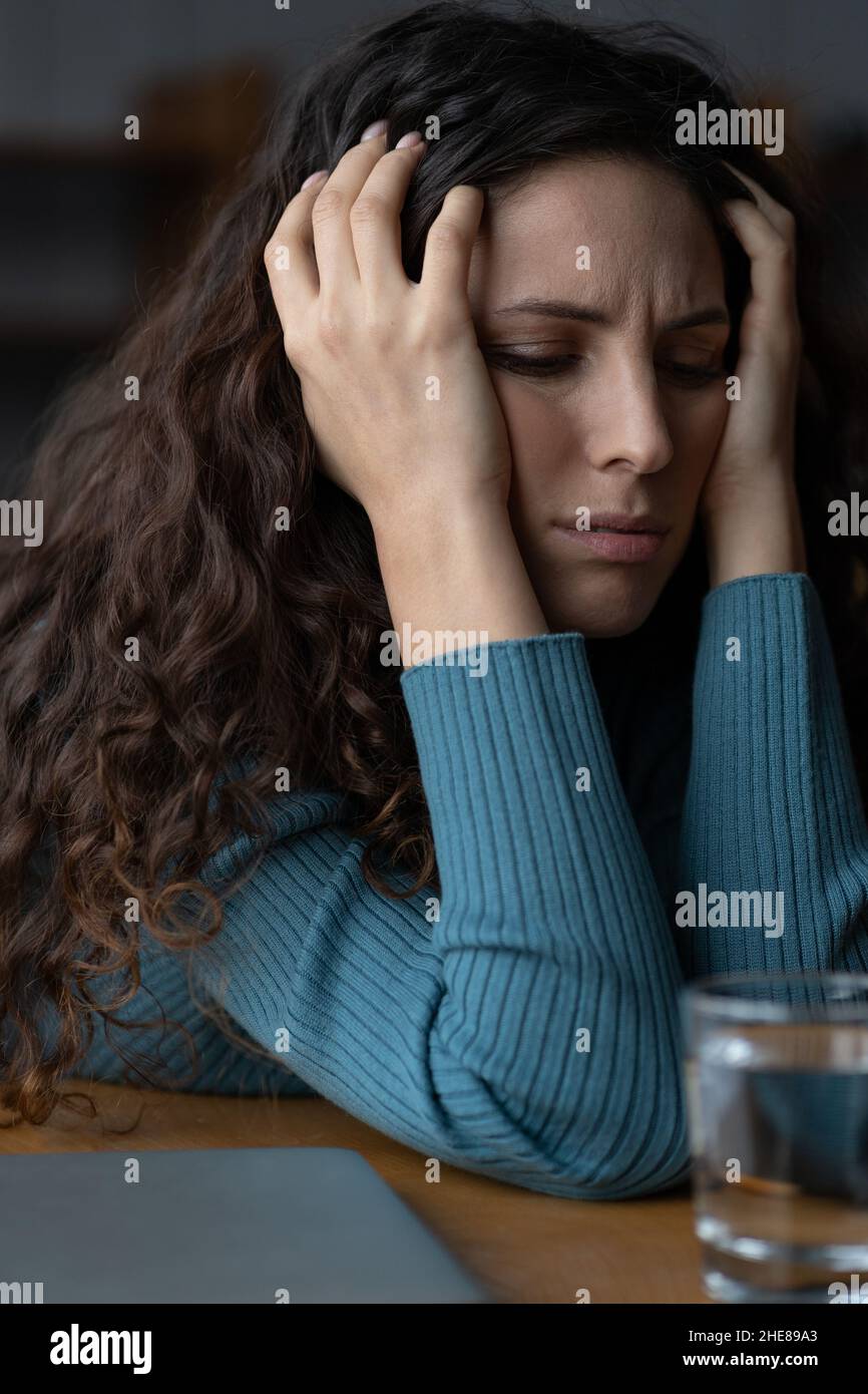 Stressed worried female employee feeling anxious about deadline at ...