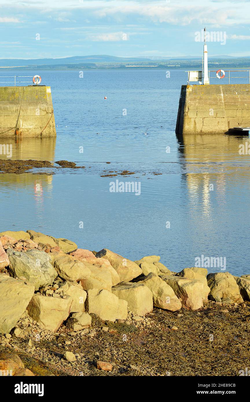 The narrow entrance to Avoch Harbour on the Black Isle. Easter Ross ...