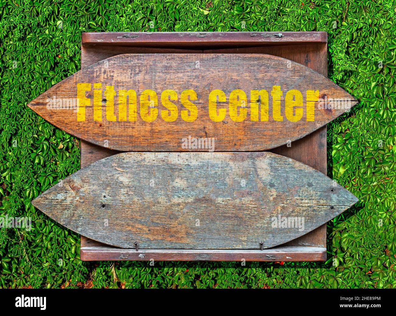 Fitness Center Wooden old sign hanged Stock Photo - Alamy
