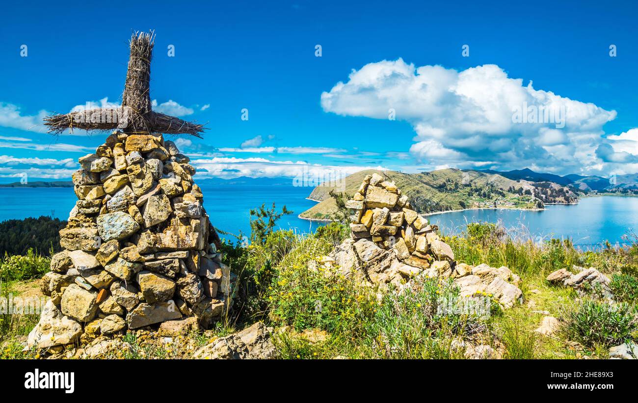 View on Lake Titicaca and cross from isla de Sol in Bolivia Stock Photo ...