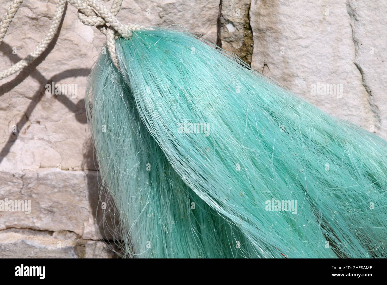 Fishing Net Or The Wig Of A Mermaid Stock Photo - Alamy