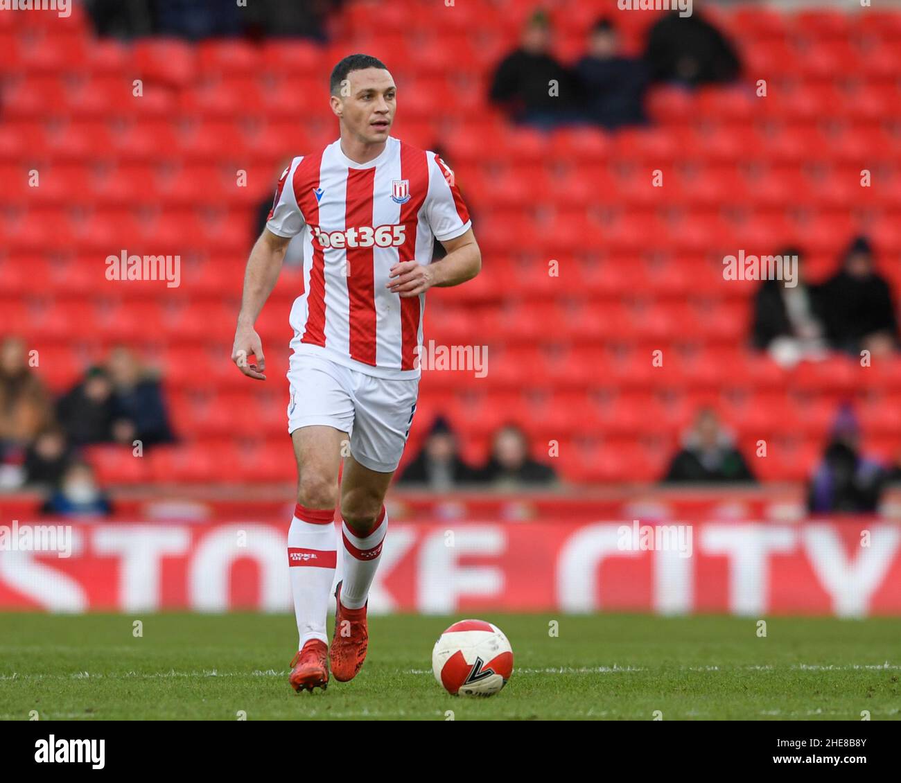 James Chester #5 of Stoke City runs forward with the ball Stock Photo ...