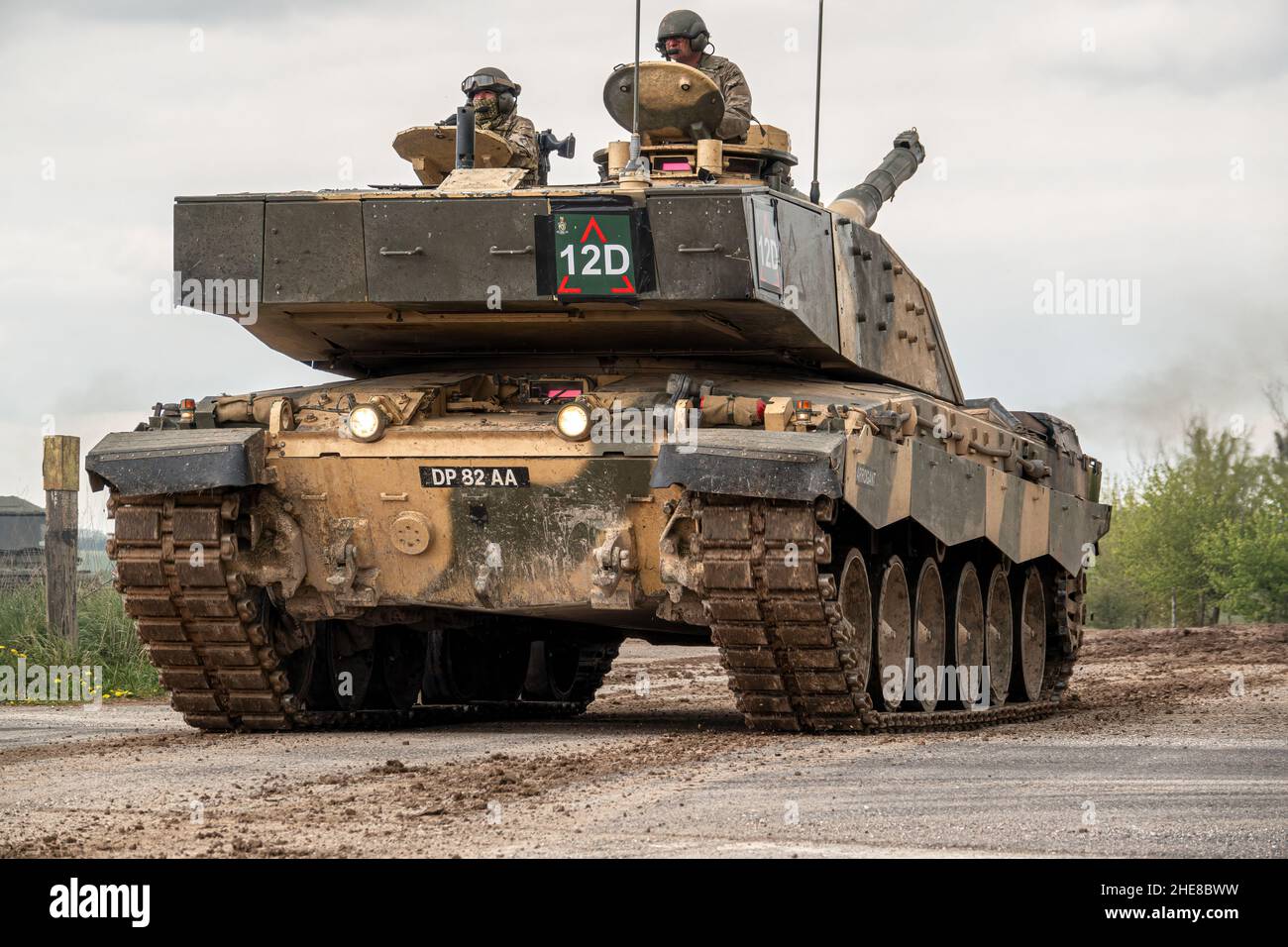 close up of a british army challenger 2 main battle tank in action on a military exercise ...