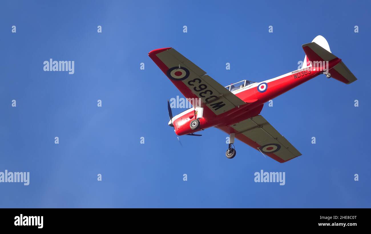 a 1951 De Havilland DHC-1 Chipmunk WD363 22 C-N C1-0304 flies low ...