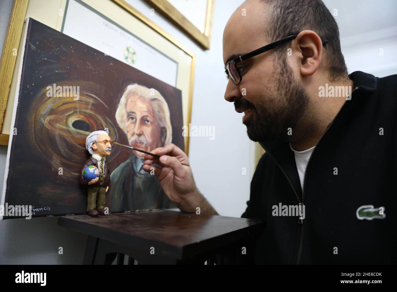 Cairo, Egypt. 2nd Jan, 2022. Egyptian artist Fady Francis cleans his ...