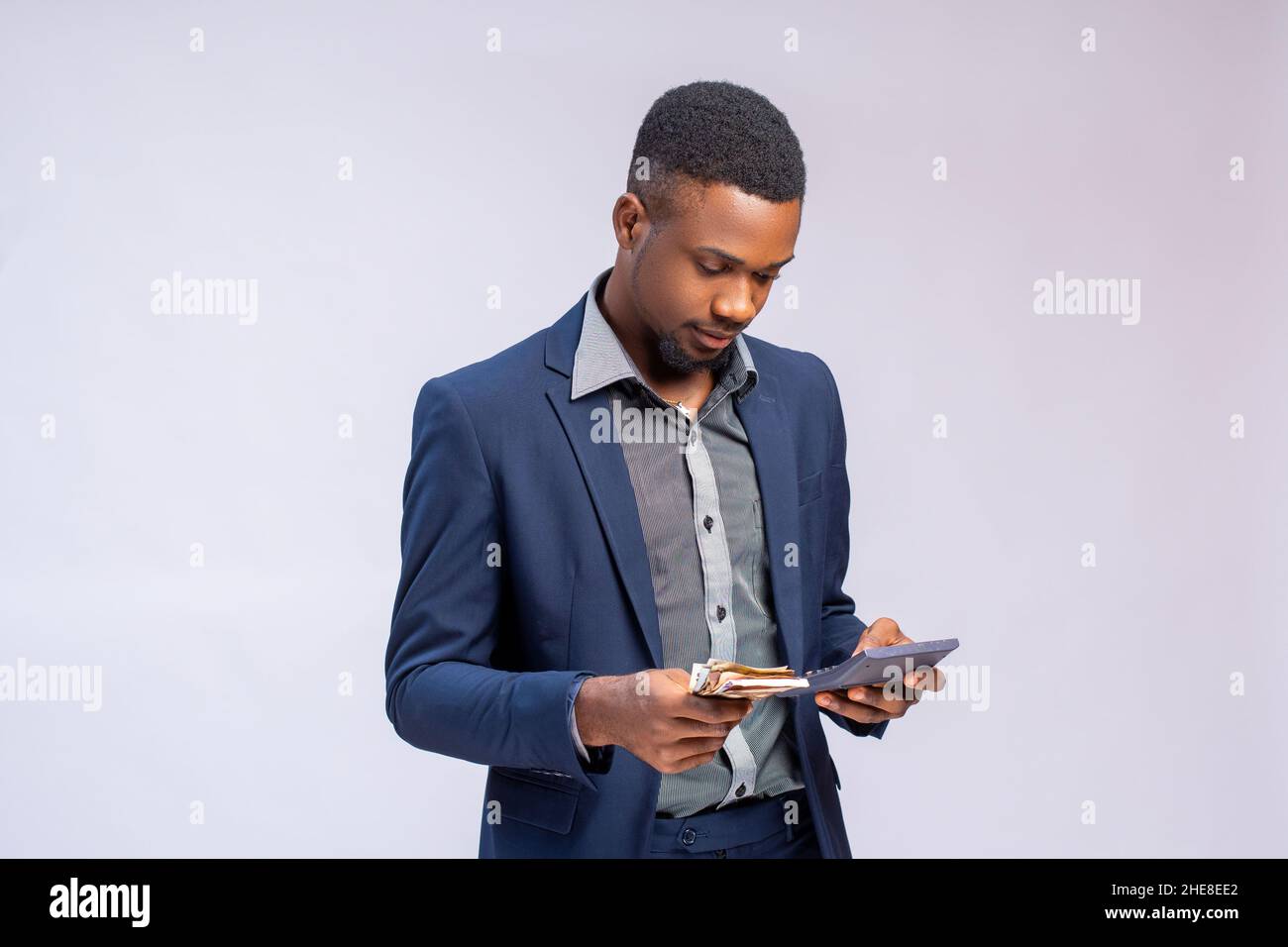 Handsome man counting money over hi-res stock photography and images ...