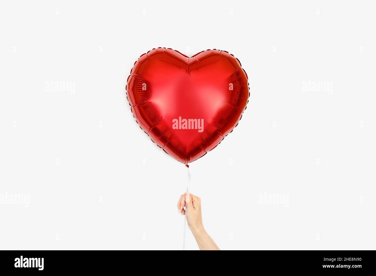 Balloon in hand romantic hi-res stock photography and images - Alamy