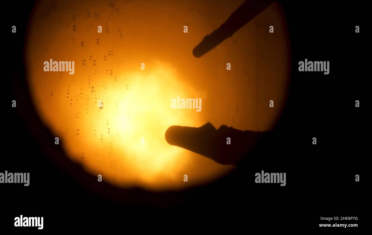 Top view of process of metal melting inside blast furnace ...