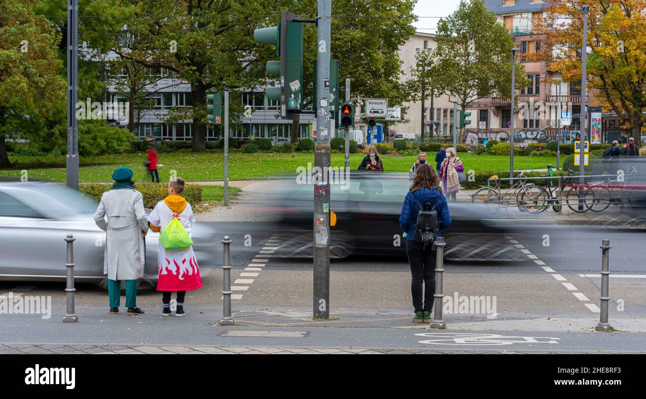 Pedestrians In Traffic Stock Photo - Alamy
