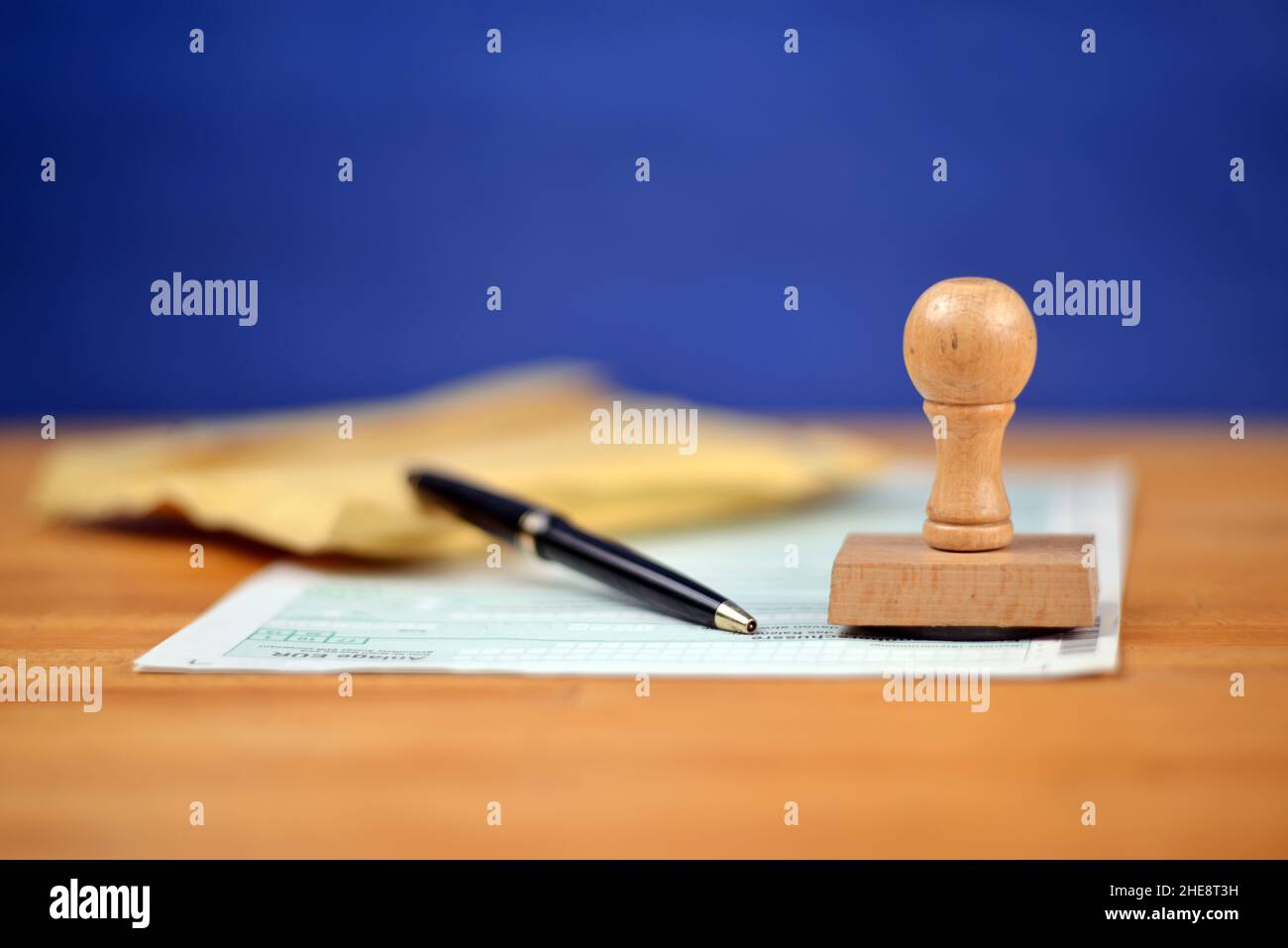 Tax declaration on desk with stamp Stock Photo - Alamy