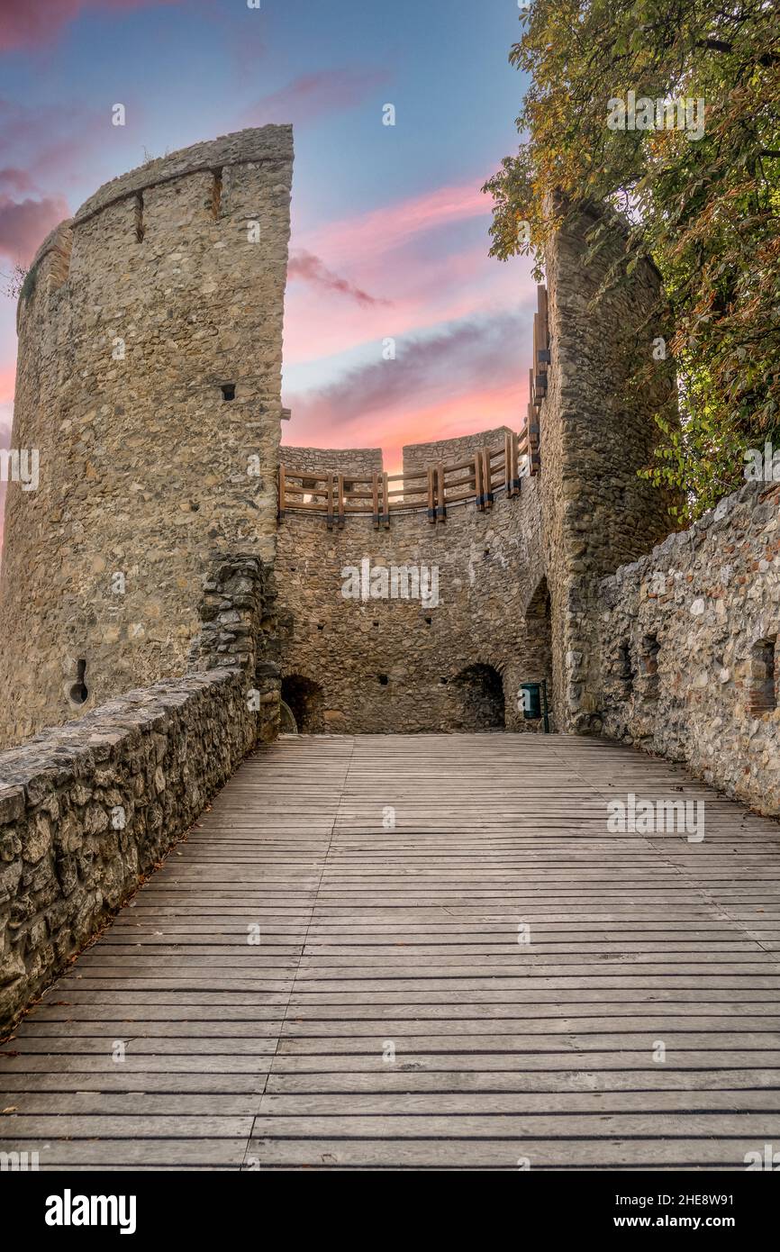 View of the walls and road leading to the famous barbakan (barbican) a ...
