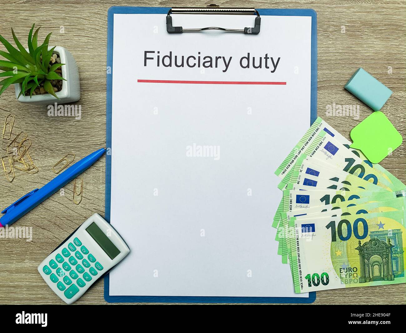 Paper with text fiduciary duty on wood table Stock Photo - Alamy