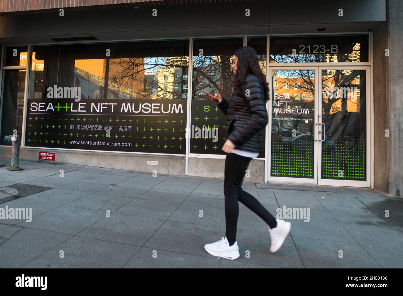 Seattle, USA. 9 Jan, 2022. A person passing Seattle’s new NFT museum in ...