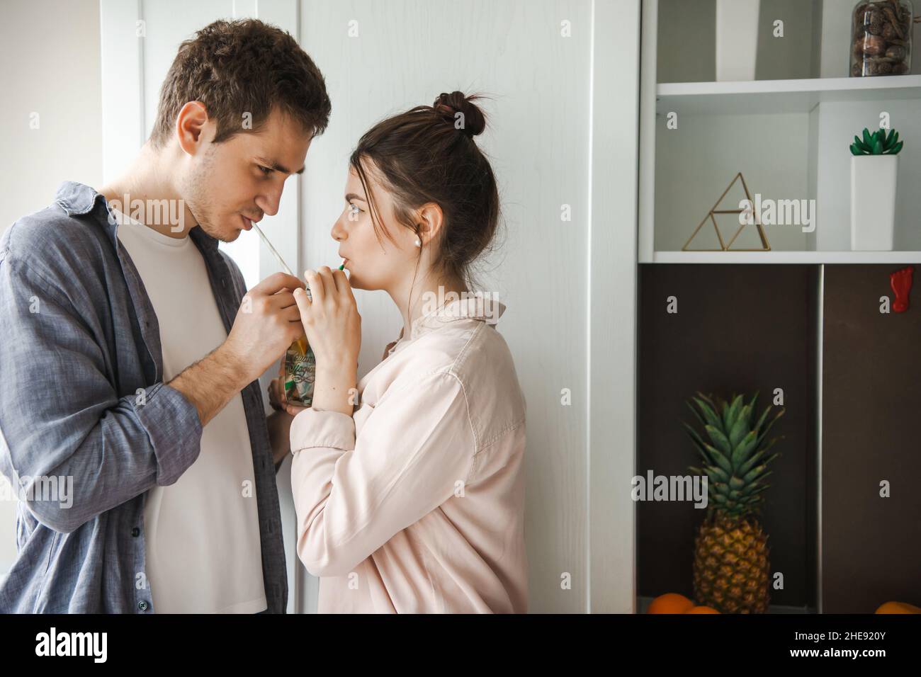 Sharing a drink hi-res stock photography and images - Alamy