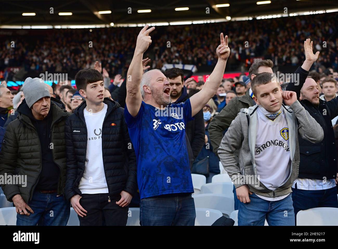 Leeds fans sing during the game Stock Photo - Alamy