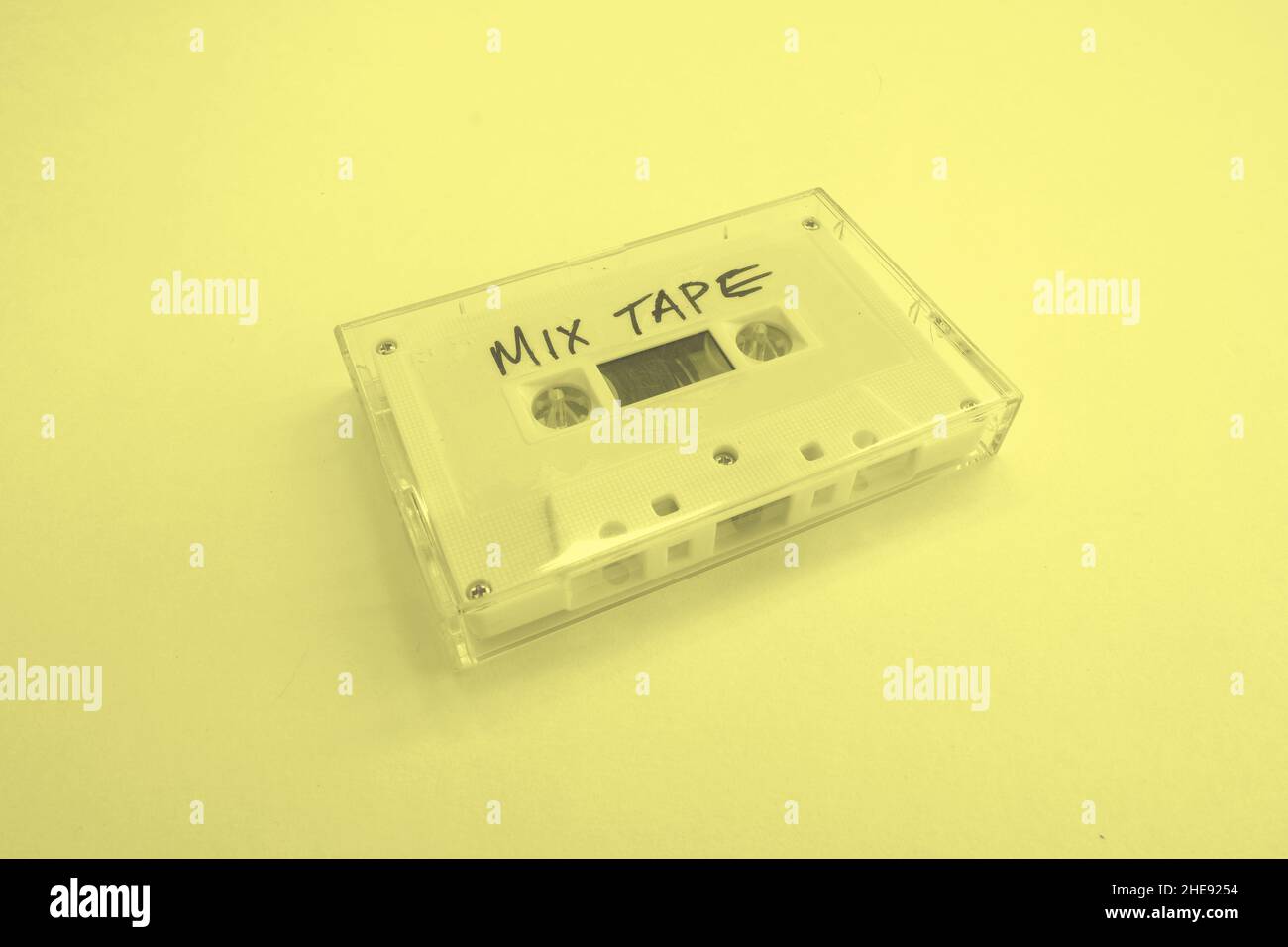 White cassette tape in clear plastic case with the words MIX TAPE ...