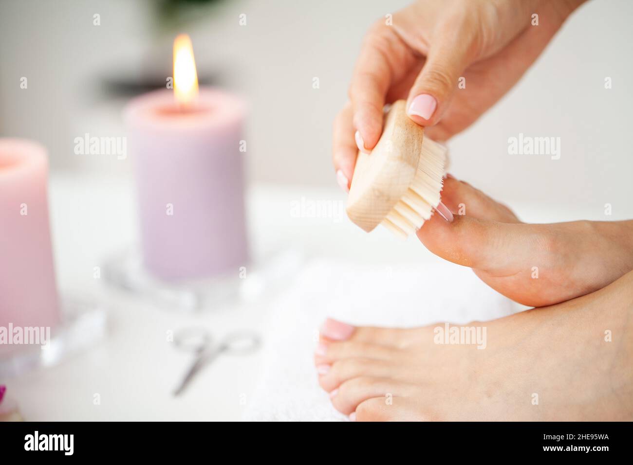 Closeup of beautiful woman legs getting pedicure at home Stock Photo ...