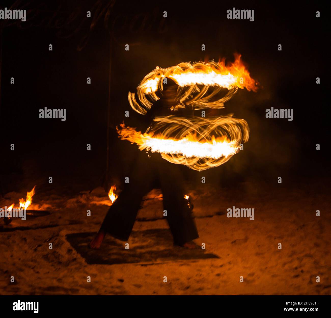 Fire show on the beach at night in Phuket, Thailand Stock Photo - Alamy