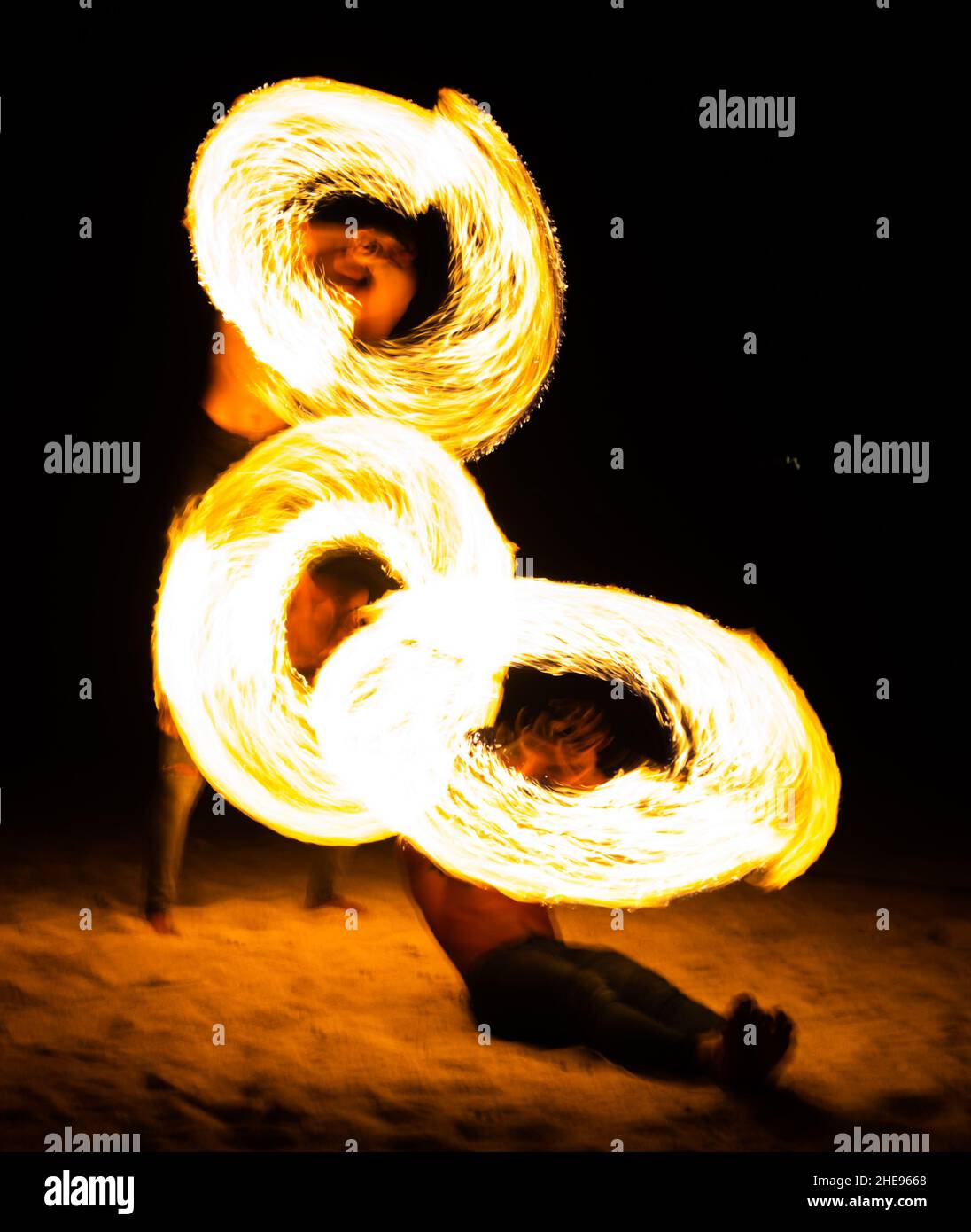Fire show on the beach at night in Phuket, Thailand Stock Photo - Alamy