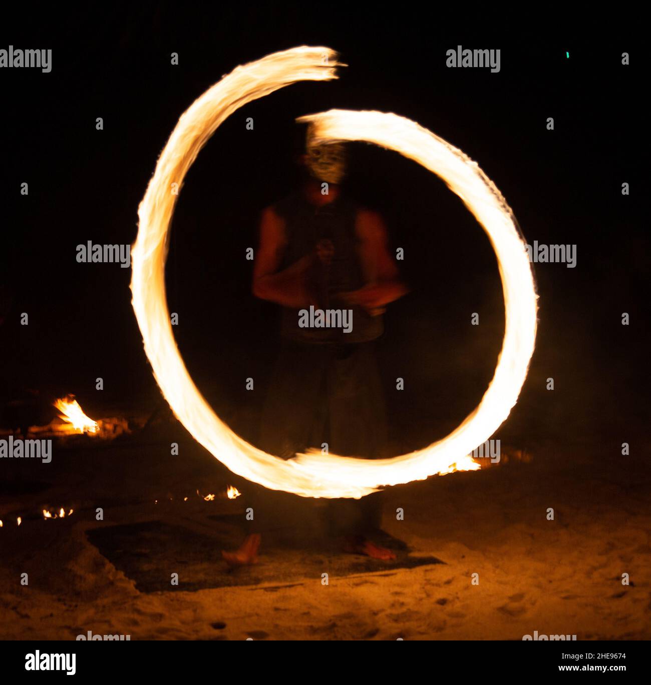 Fire show on the beach at night in Phuket, Thailand Stock Photo - Alamy
