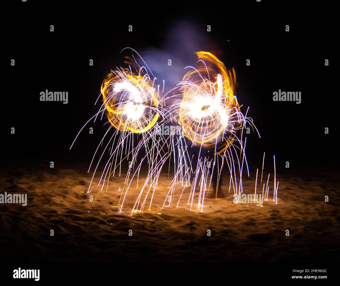 Fire show on the beach at night in Phuket, Thailand Stock Photo - Alamy