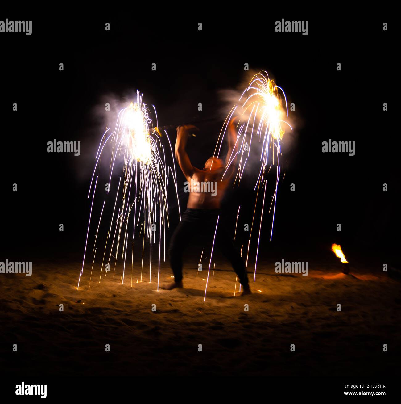 Fire show on the beach at night in Phuket, Thailand Stock Photo - Alamy