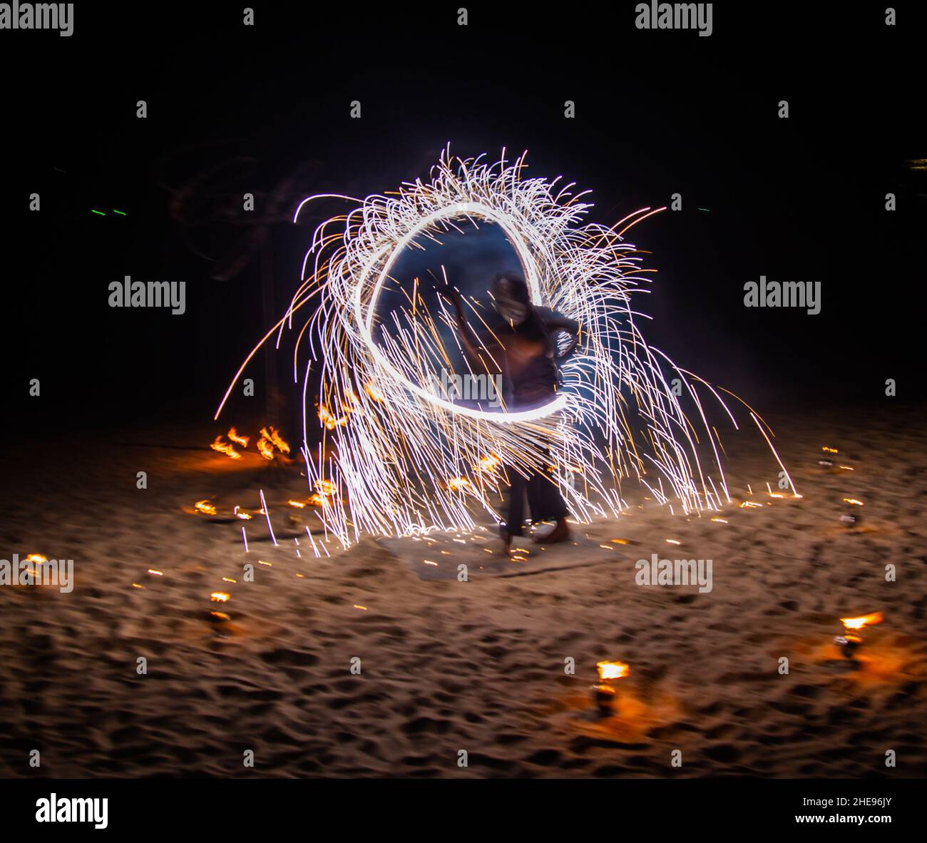 Fire show on the beach at night in Phuket, Thailand Stock Photo - Alamy