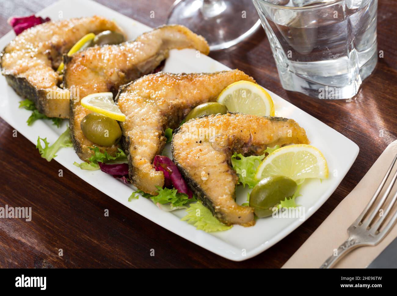 Tasty fish dish - roasted sturgeon Stock Photo - Alamy