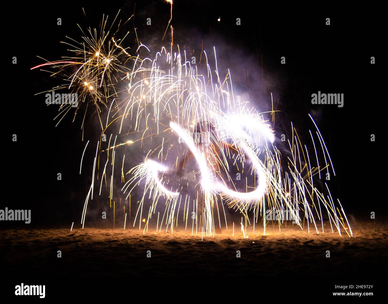 Fire show on the beach at night in Phuket, Thailand Stock Photo - Alamy