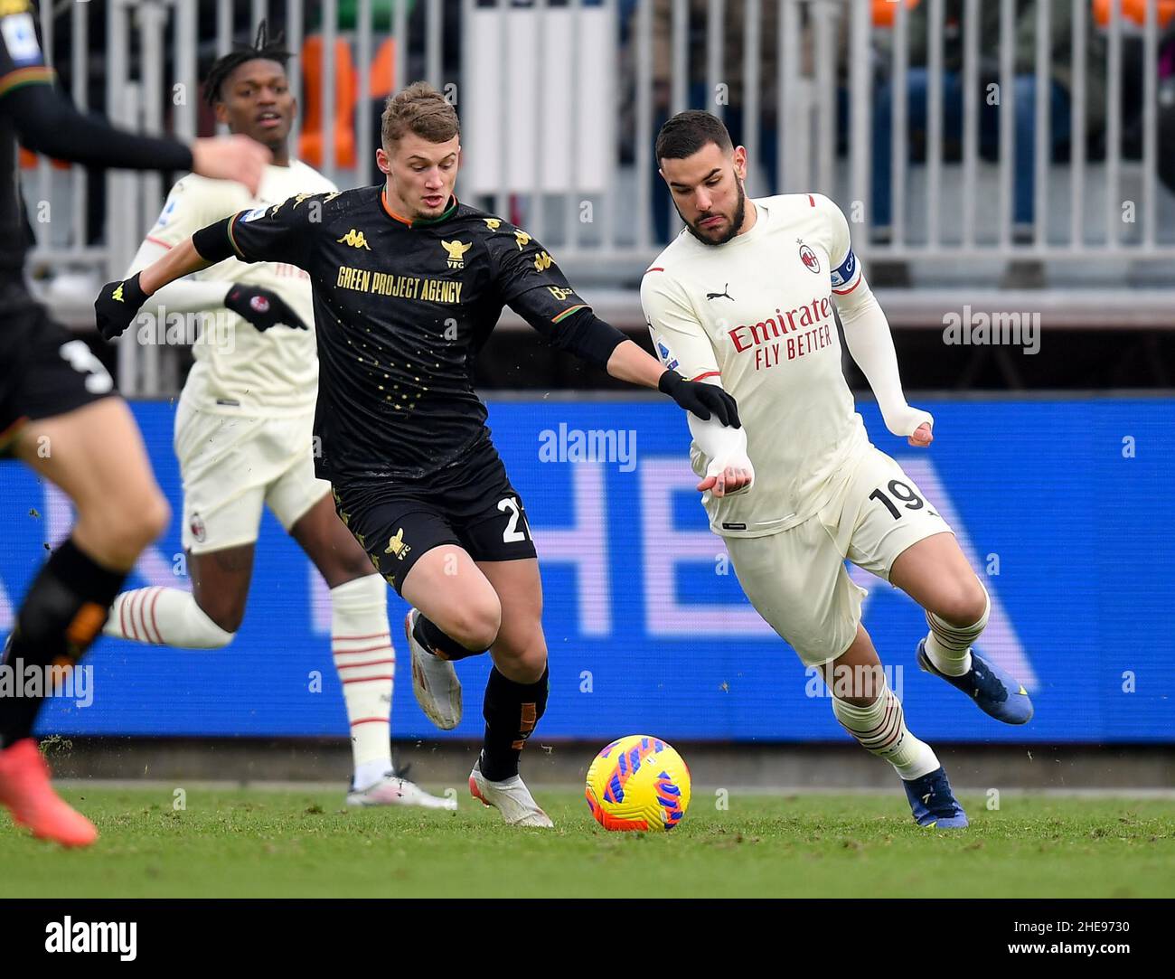 Venice, Italy. 9th Jan, 2022. AC Milan's Theo Hernandez (R) vies with ...