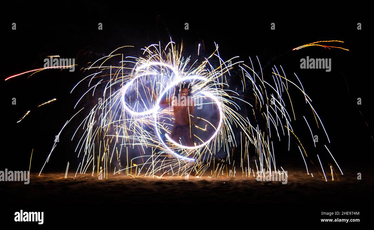 Fire show on the beach at night in Phuket, Thailand Stock Photo - Alamy