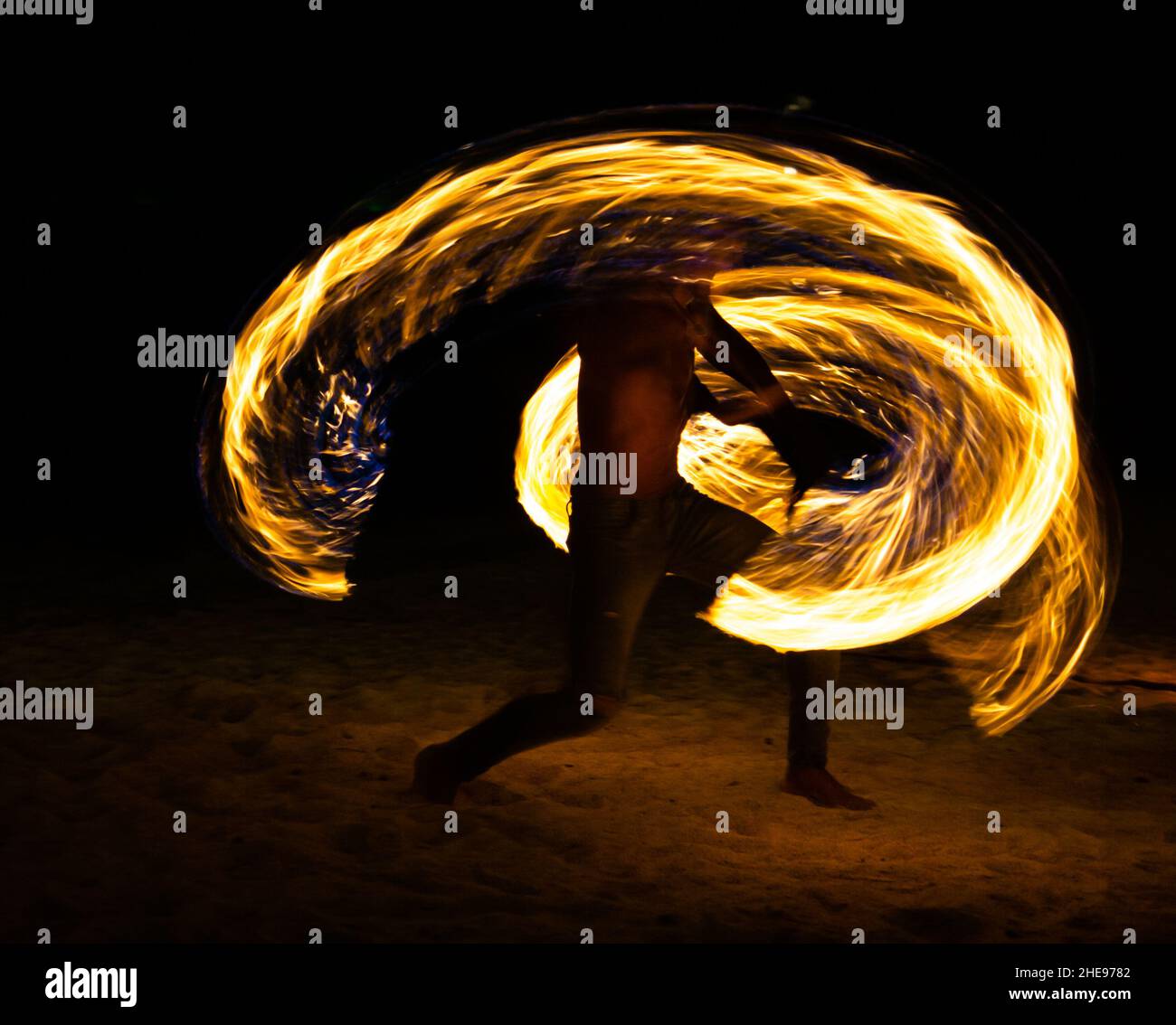 Fire show on the beach at night in Phuket, Thailand Stock Photo - Alamy