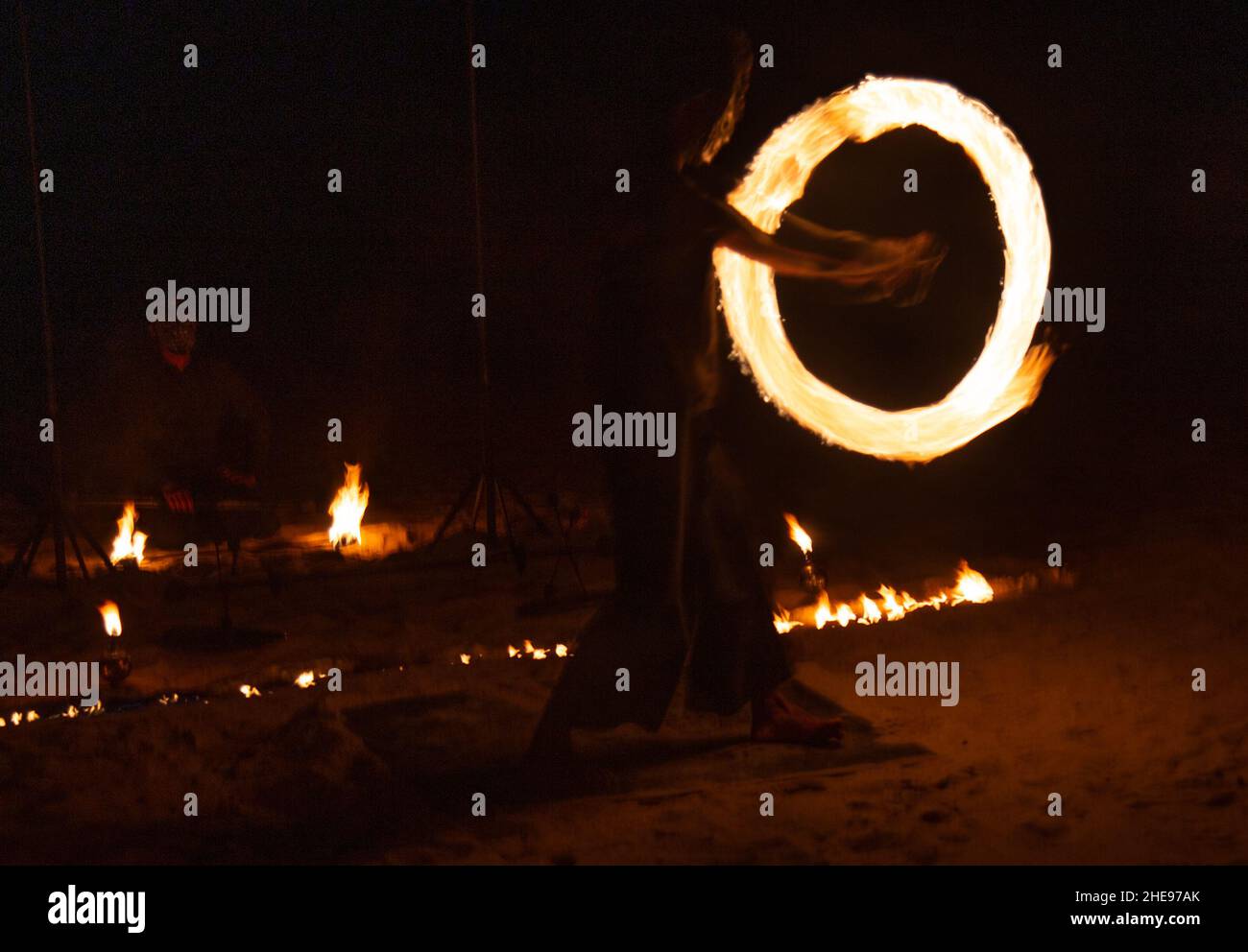 Fire show on the beach at night in Phuket, Thailand Stock Photo - Alamy