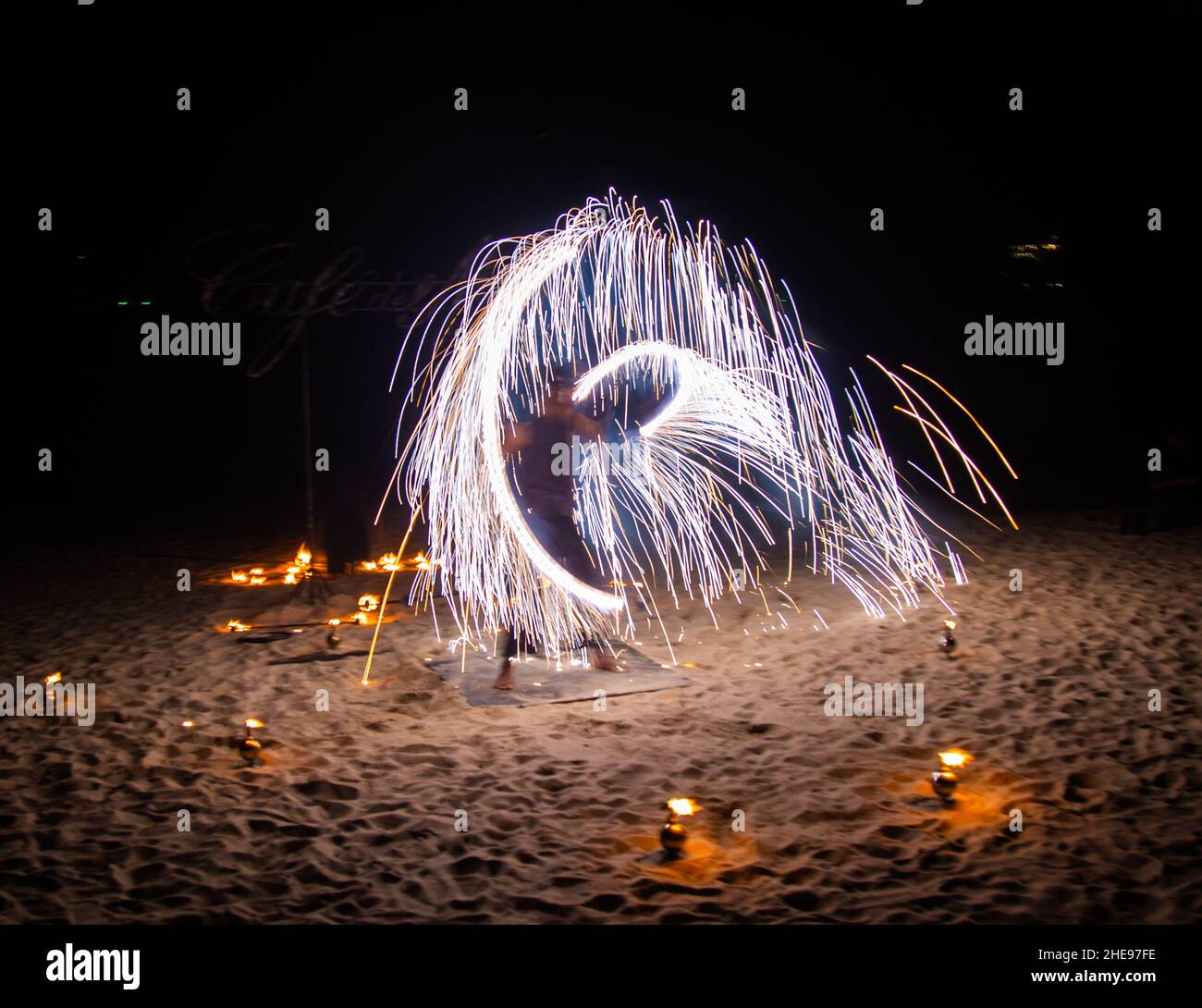 Fire show on the beach at night in Phuket, Thailand Stock Photo - Alamy